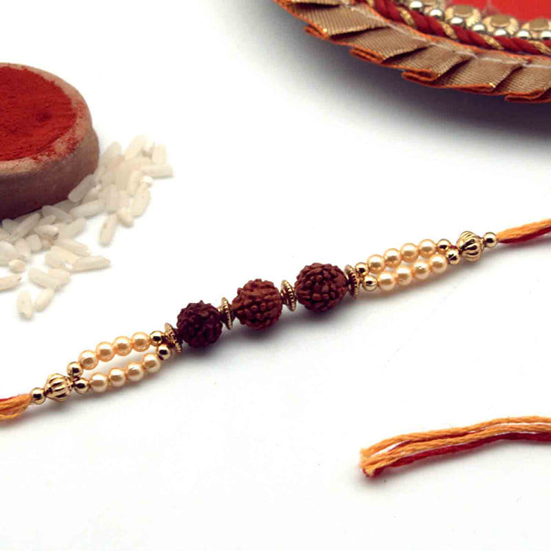 Send Rakhi to New York Online | Rakhi Delivery in New York | FlowerAura