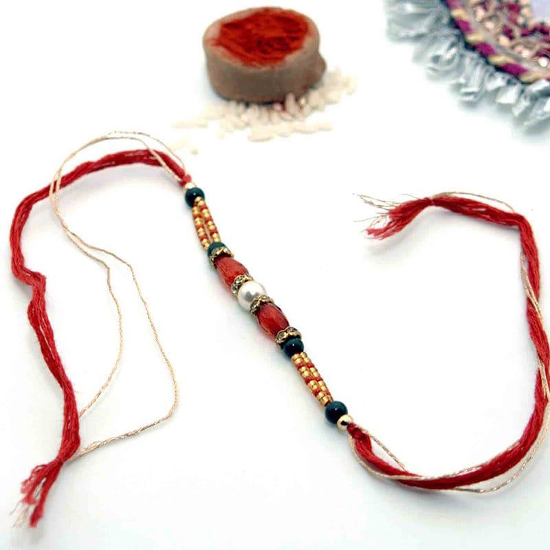 Send Rakhi to New York Online | Rakhi Delivery in New York | FlowerAura